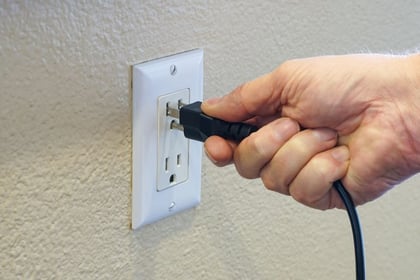 How do I know if my electrical outlet needs replacing?
